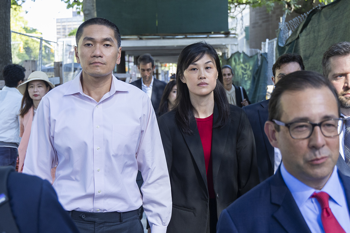 A former aide to New York governors and her husband face new charges in foreign agent of China case